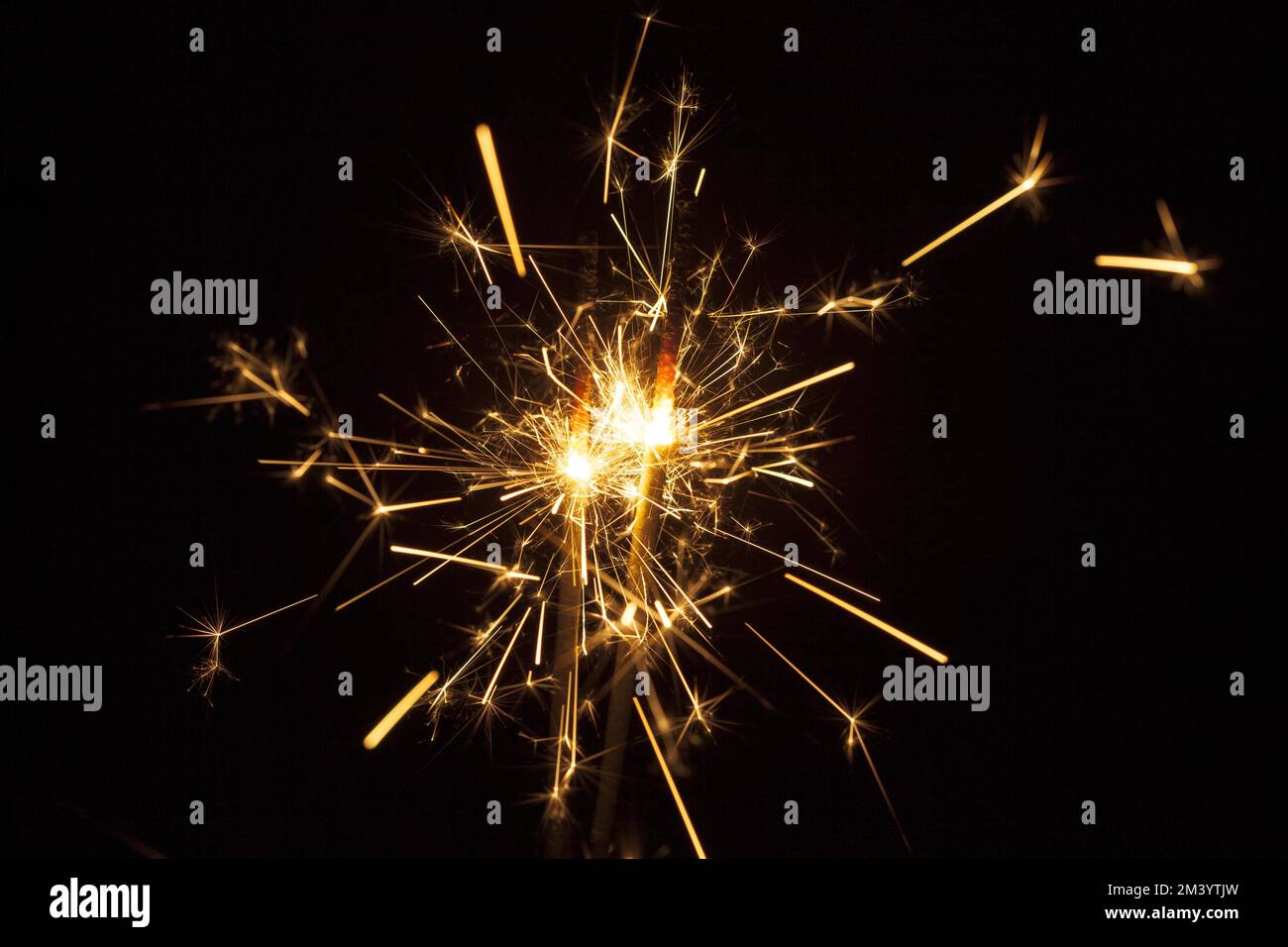 Decorative sparklers with sparks Stock Photo - Alamy