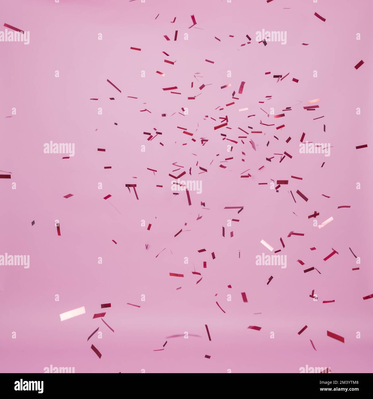 Dark confetti falling pink background Stock Photo - Alamy