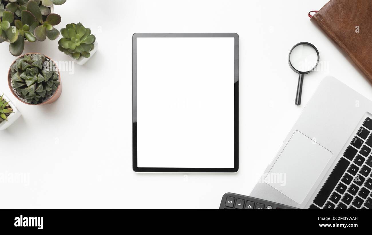 Flat lay desk elements arrangement with empty screen tablet Stock Photo ...