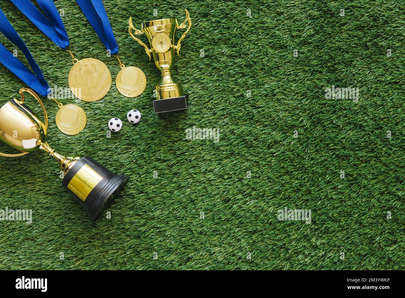 Football background with medals trophy Stock Photo - Alamy