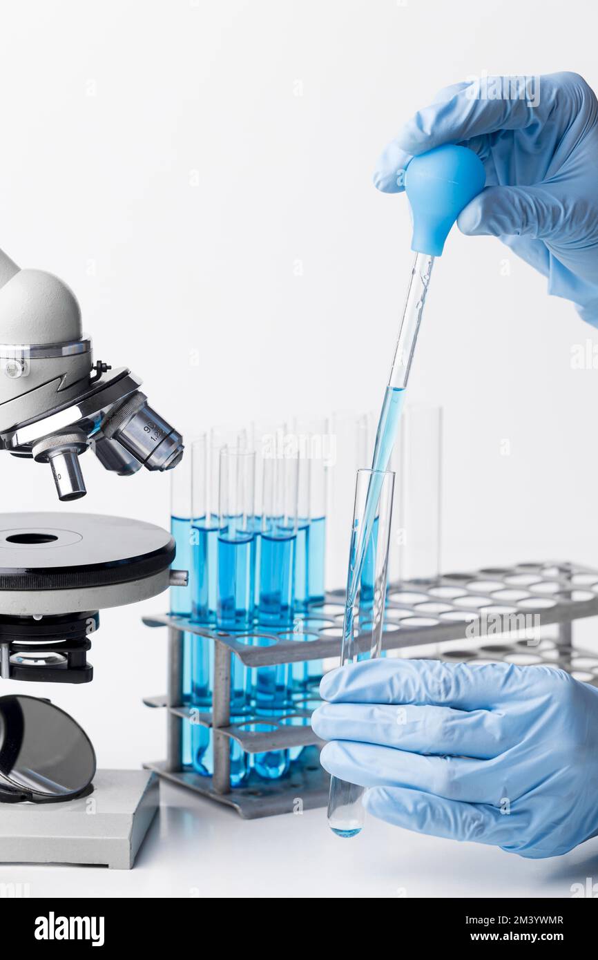 Front view blue chemical substances lab Stock Photo - Alamy