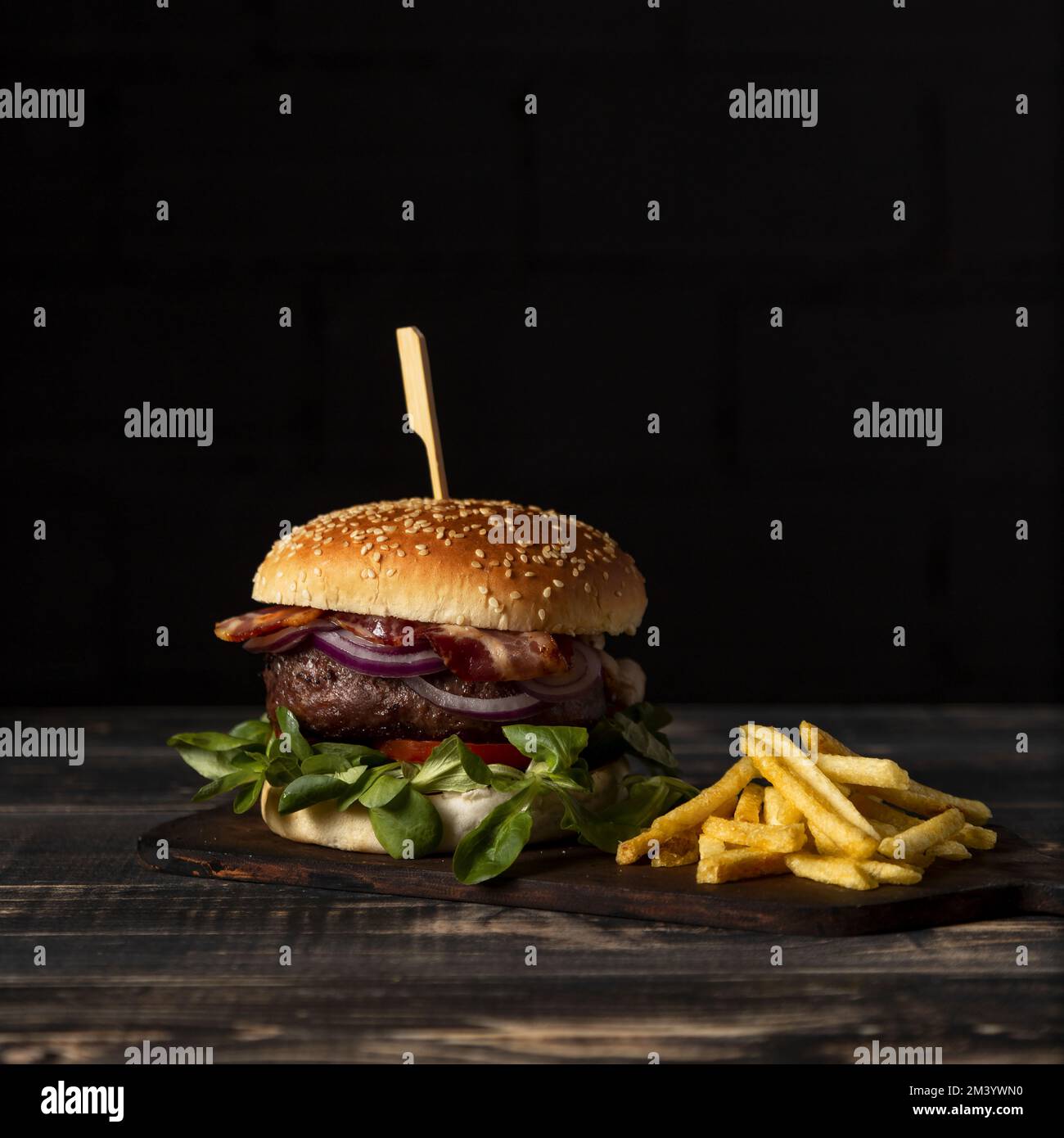 Front view burger fries table Stock Photo - Alamy