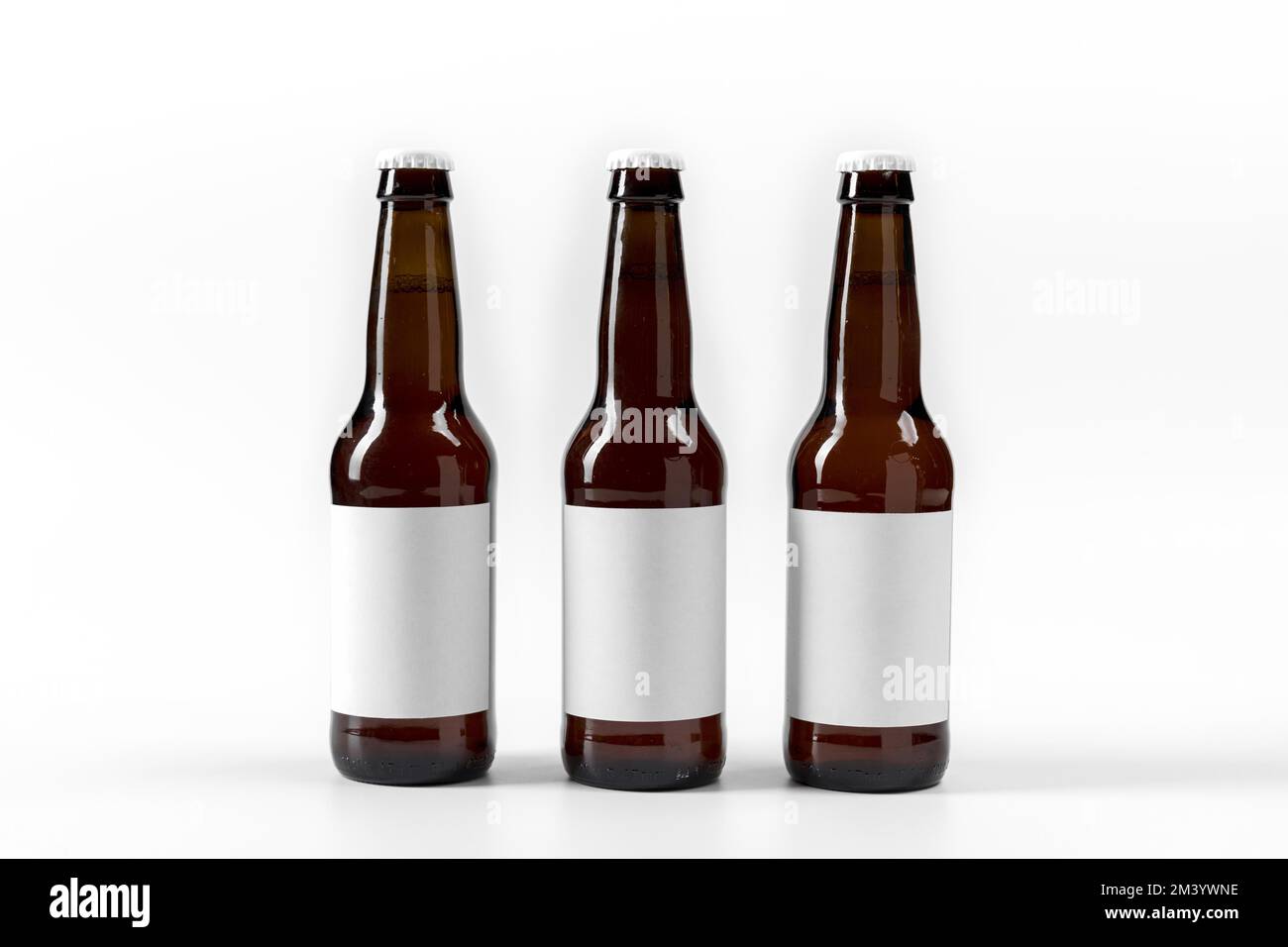 Front view beers line with blank labels Stock Photo - Alamy