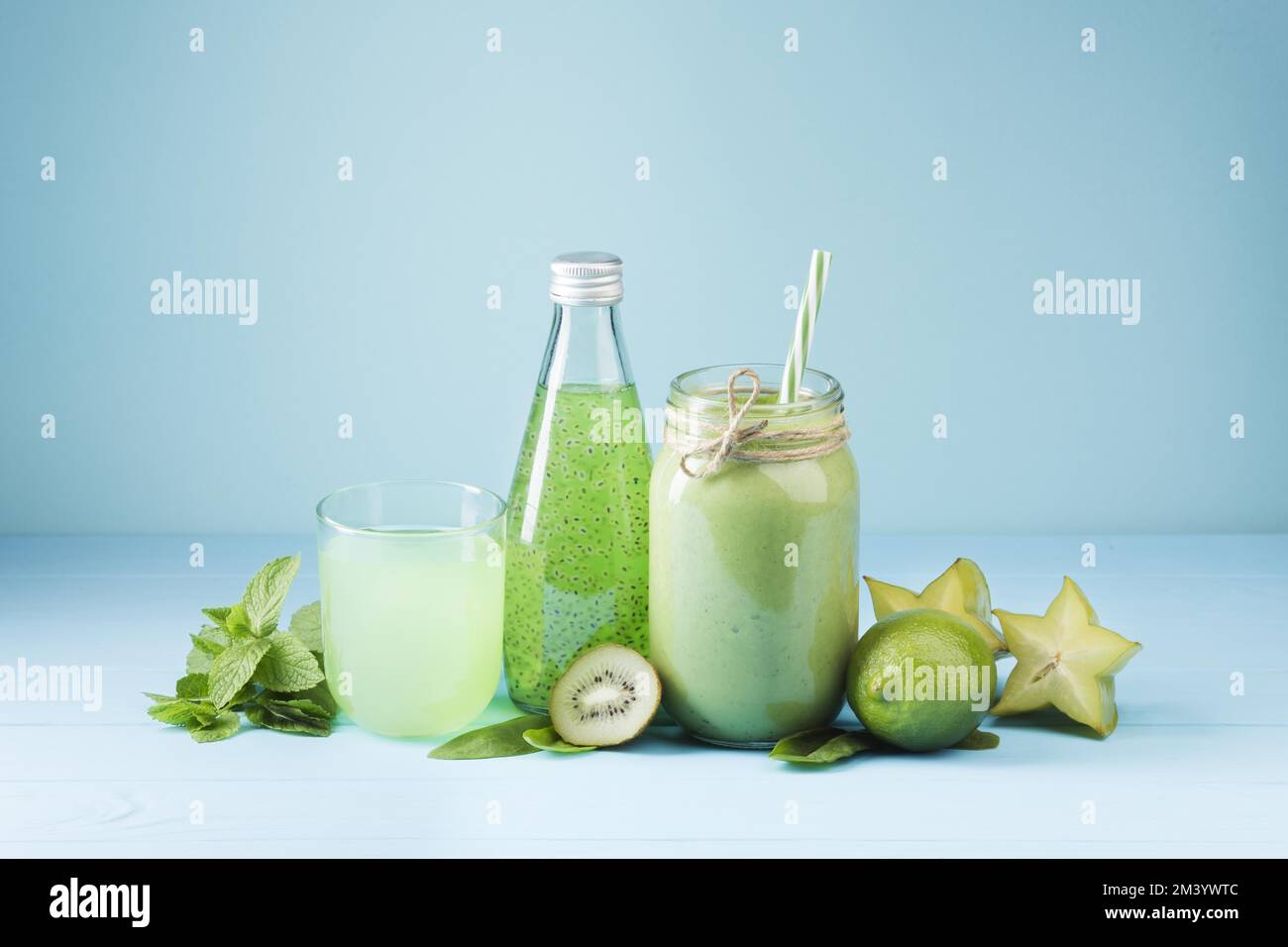Front view green smoothie drinks Stock Photo - Alamy
