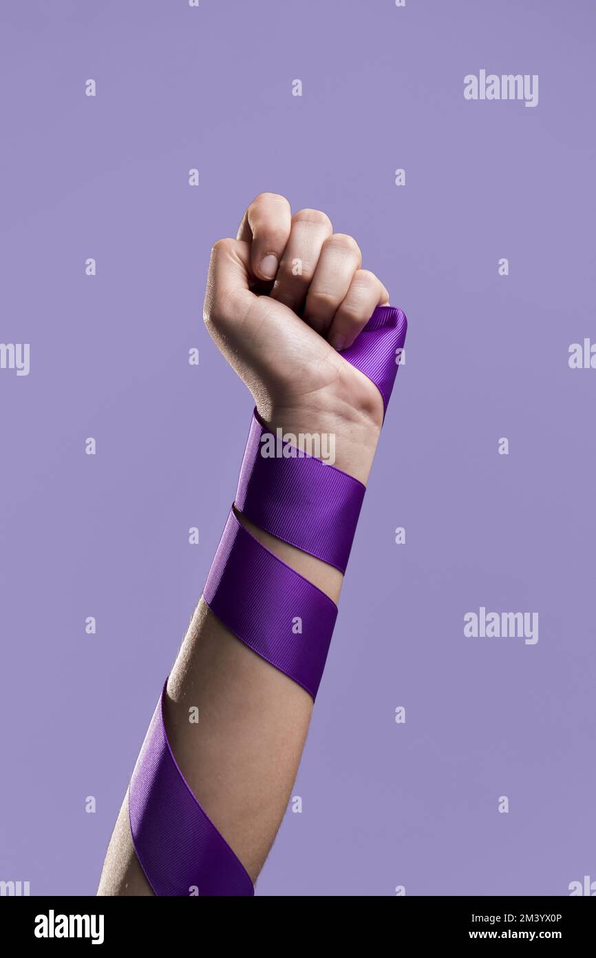 Front view woman s fist with ribbon Stock Photo - Alamy