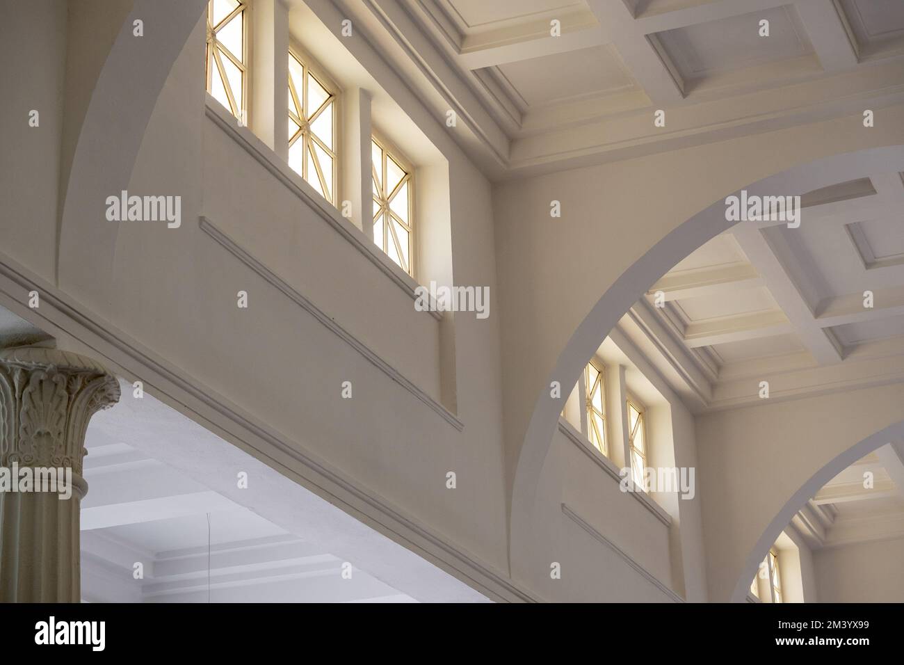 A low angle of the beautiful white design of a building constructed ...