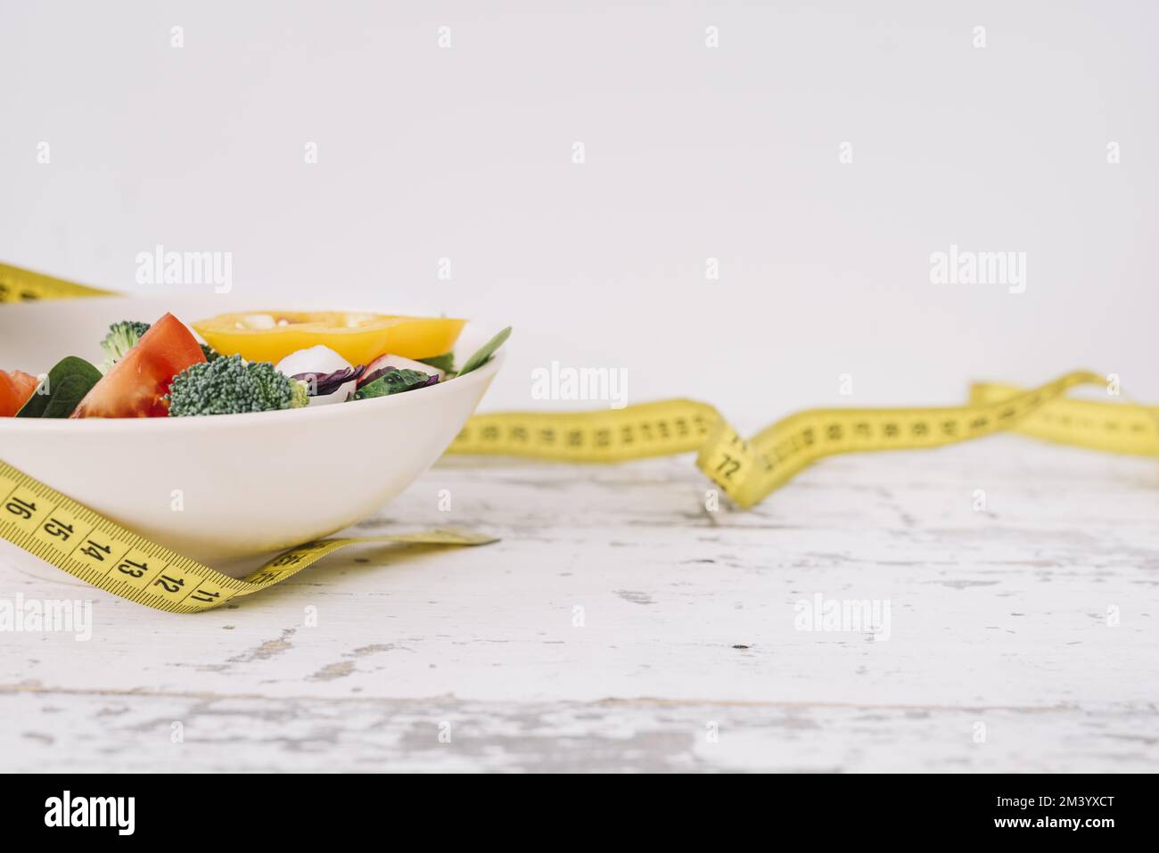 Healthy food measurement tape Stock Photo - Alamy