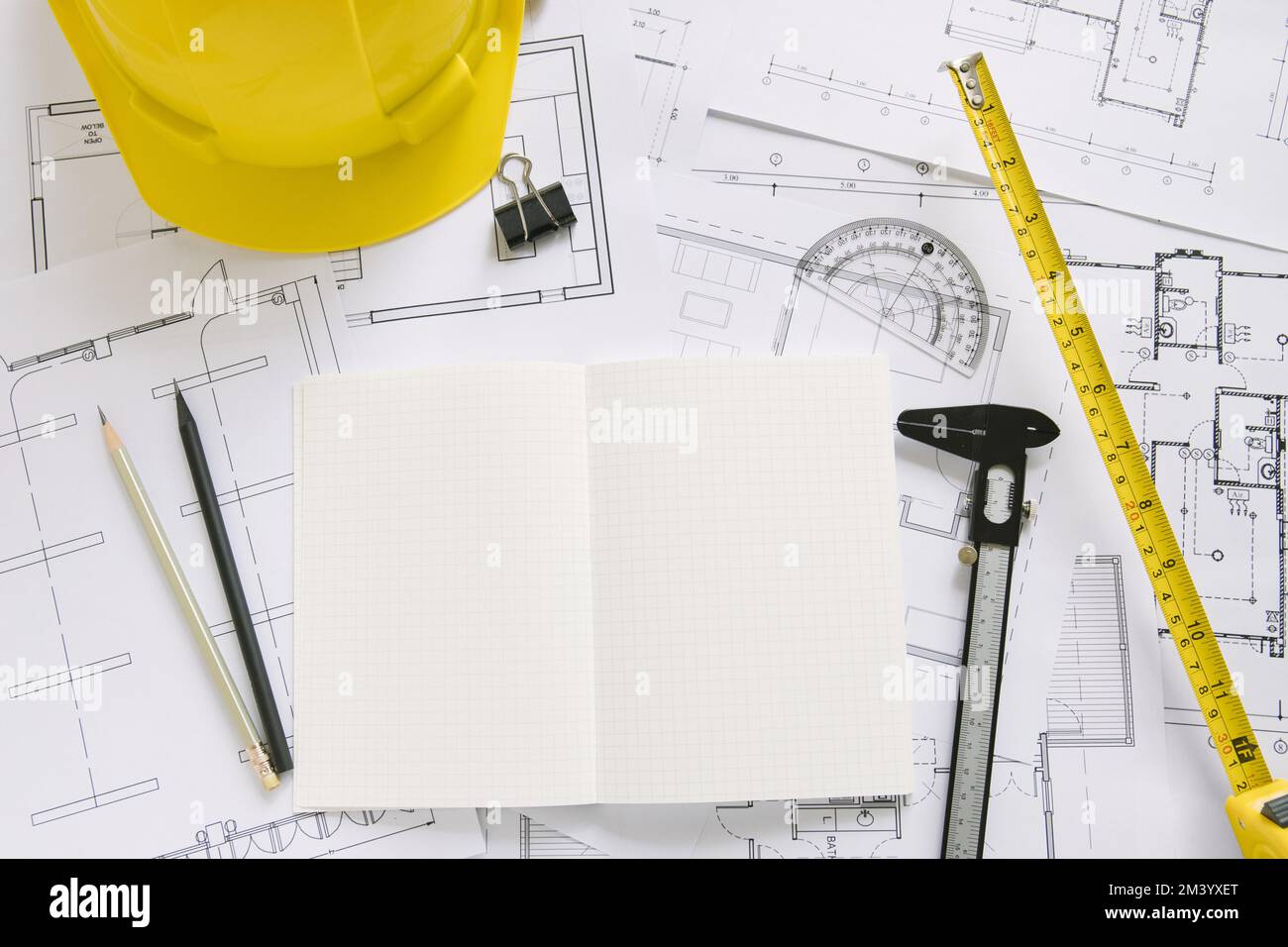 Helmet drafting supplies blueprints Stock Photo - Alamy