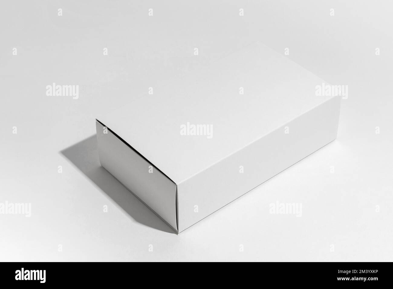High angle composition with white box Stock Photo - Alamy