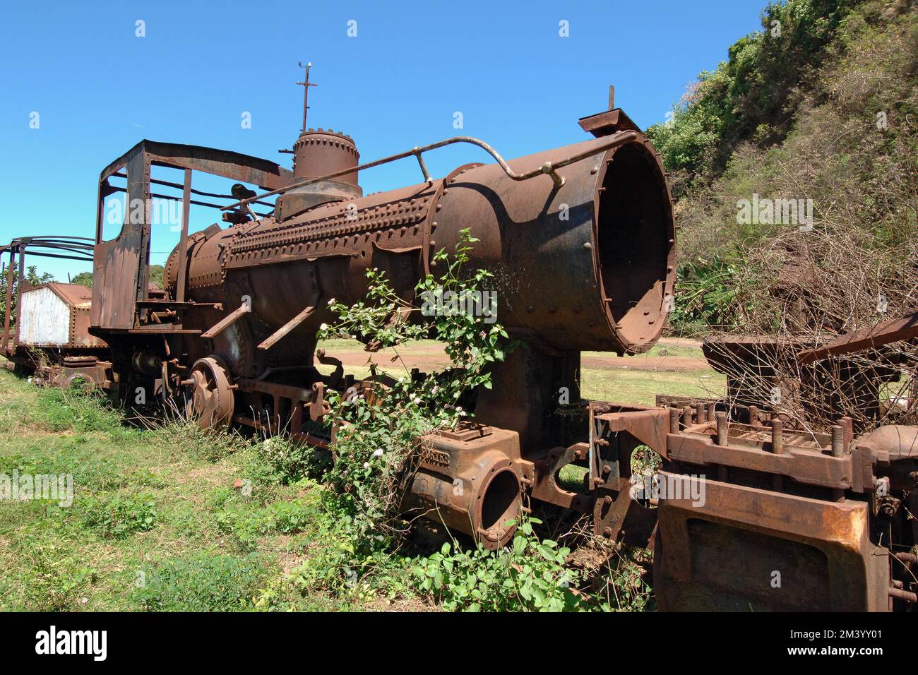Rusty steam locomotive for operation with coal stands on siding is ...
