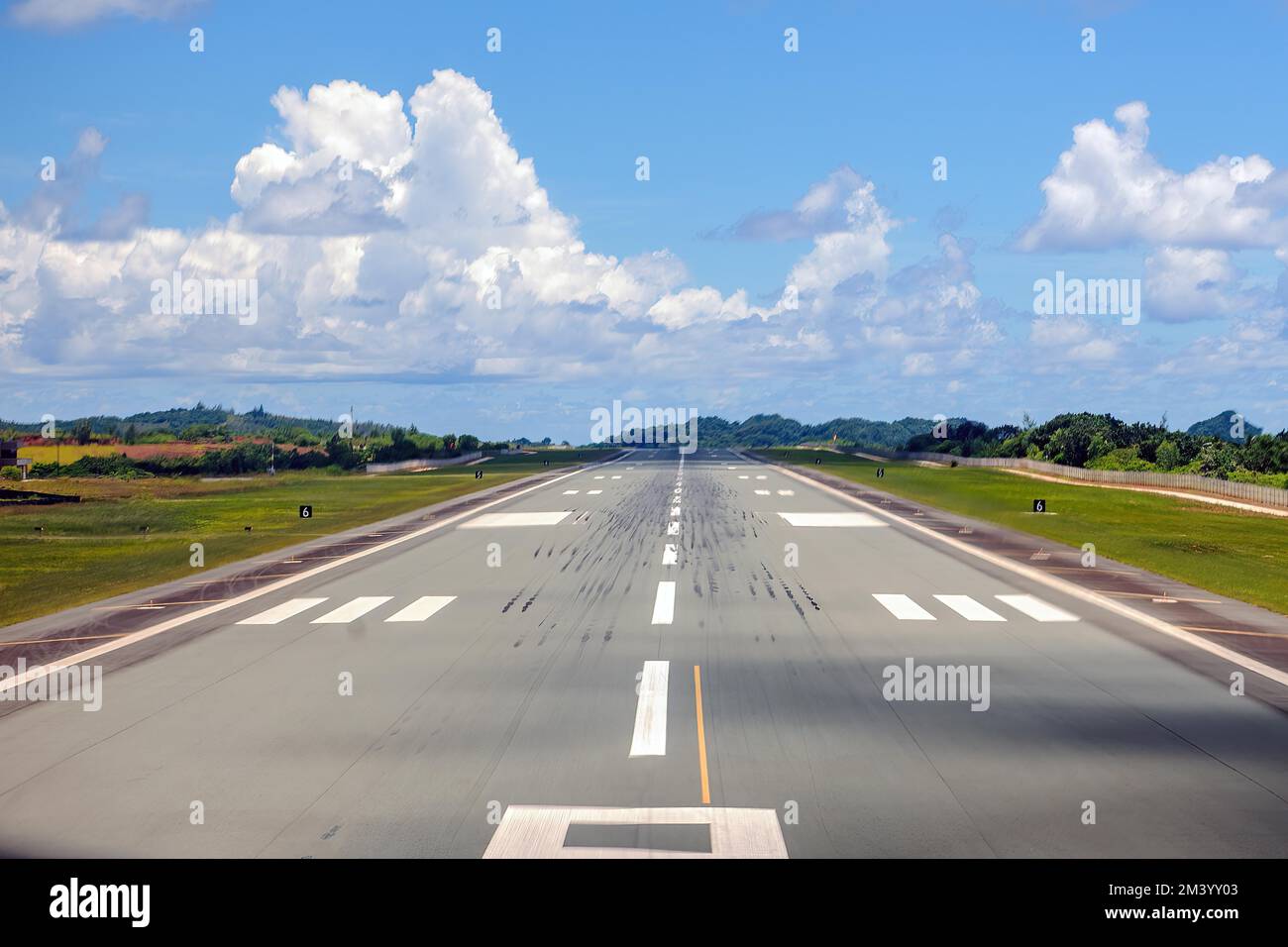 View from cockpit of aircraft on runway landing strip of Palau Koror ...