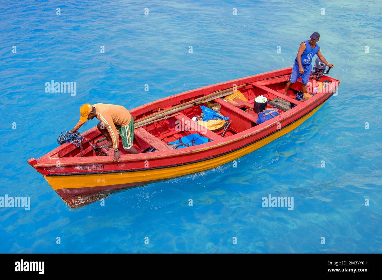 Coloured fishing boat enters harbour lagoon, Santa Maria, St. Maria ...
