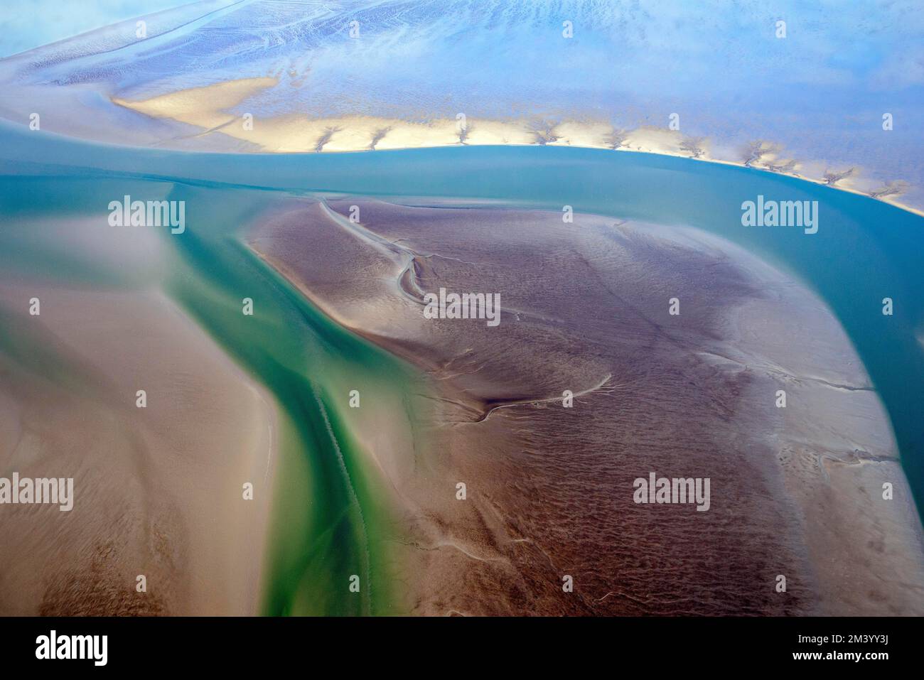Aerial view of tidal creeks and sandbanks in the North Sea, Wadden Sea ...