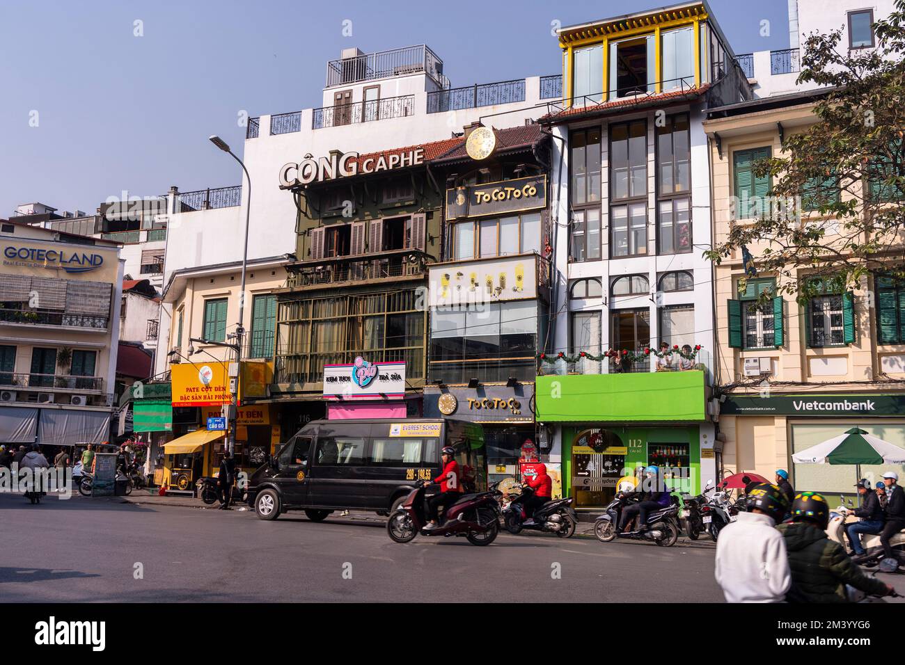 Hoan Kiem Lake and modern buildings in background in Hanoi, Thailand ...