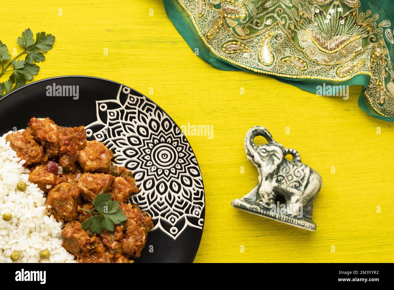 Indian food assortment with sari flat lay Stock Photo - Alamy