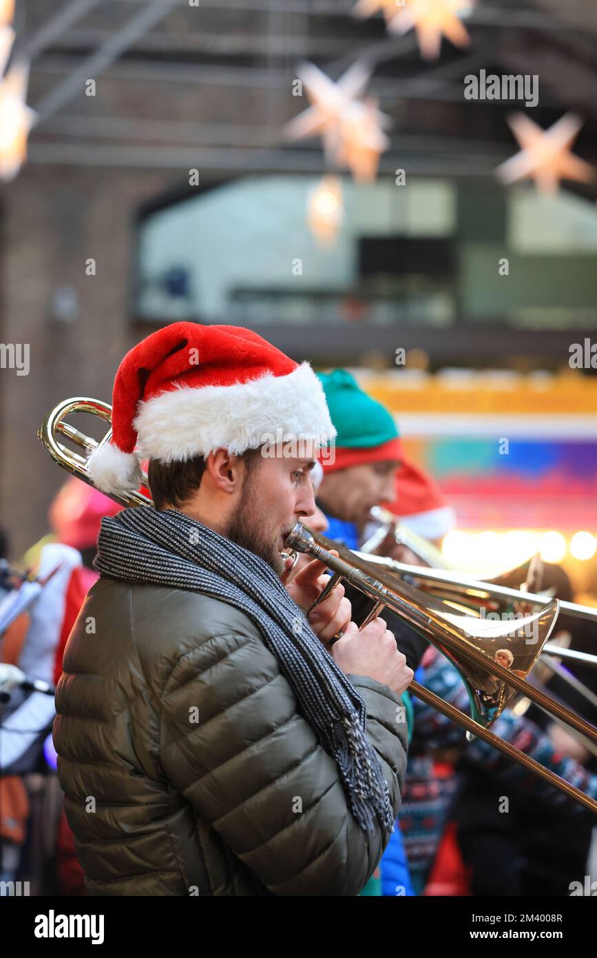 Local brass band playing Christmas music on Canopy Market at Kings ...