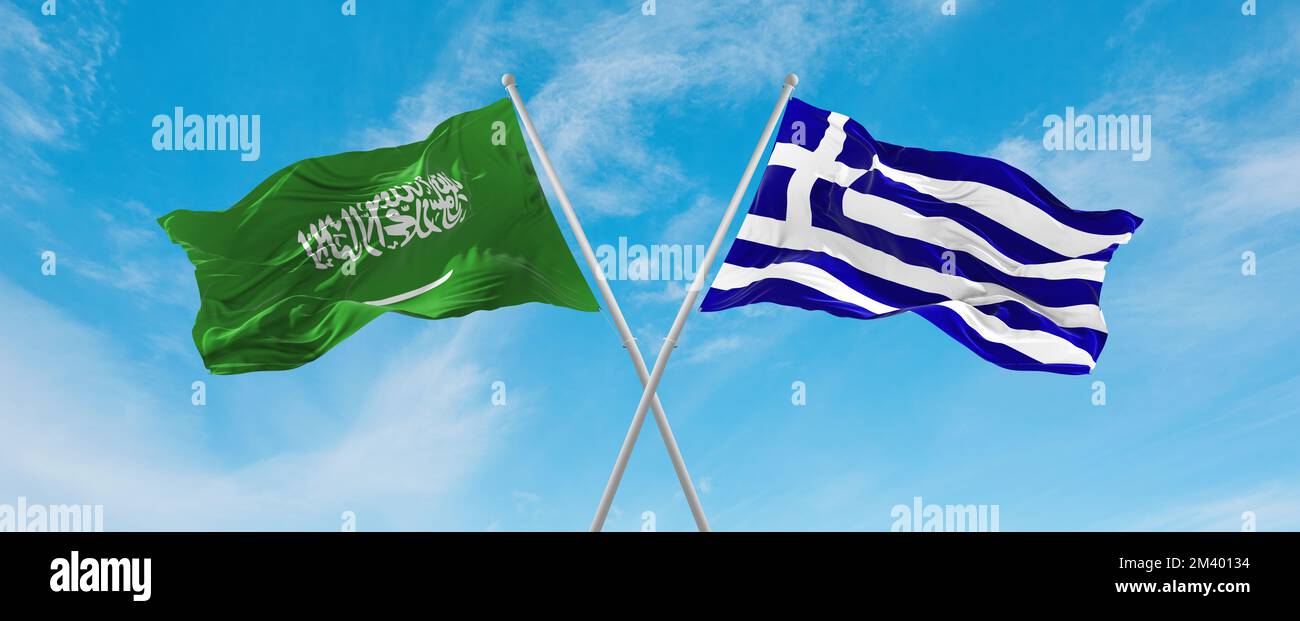two crossed flags Greece and Saudi Arabia waving in wind at cloudy sky ...