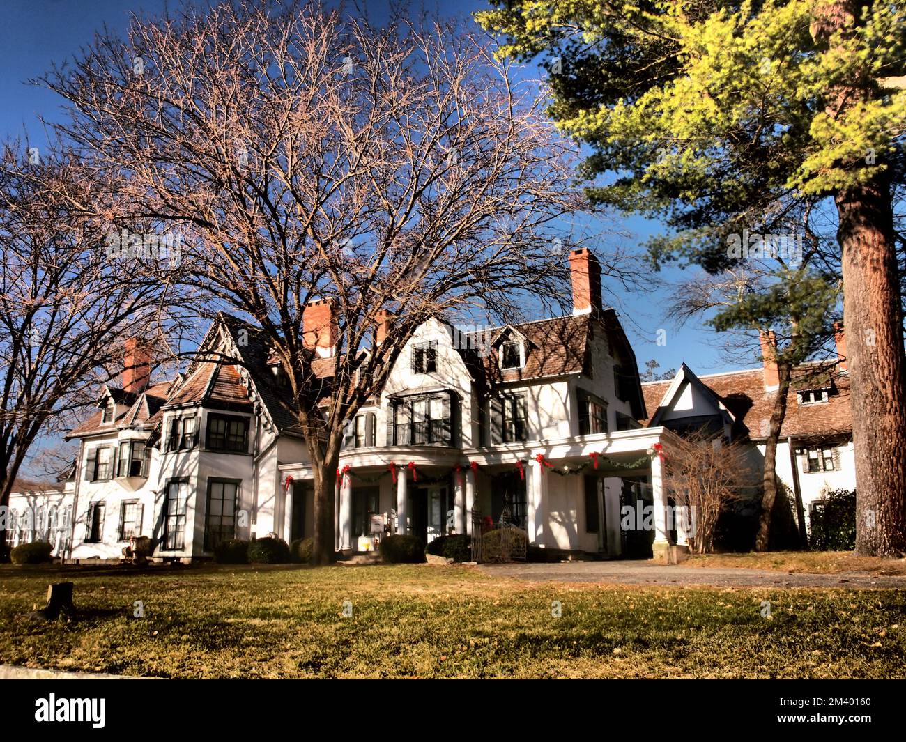 Sunshining on a large victorian era home hi-res stock photography and ...