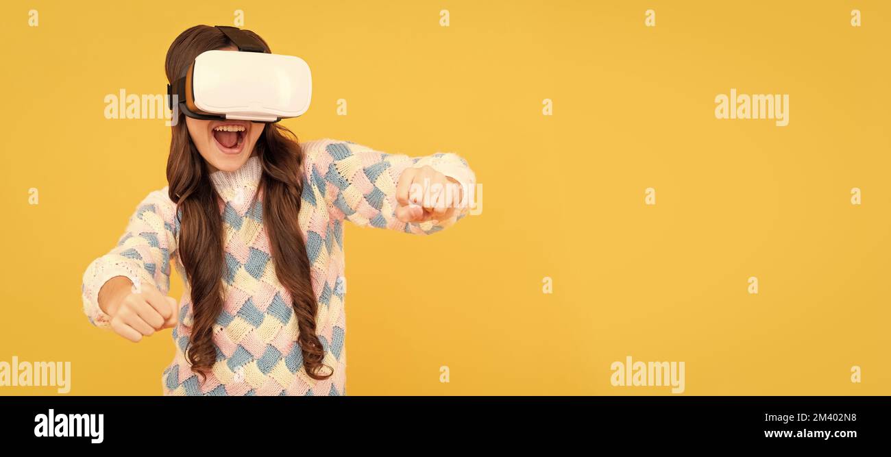 happy teen girl wear wireless VR glasses. using VR headset. kid play ...