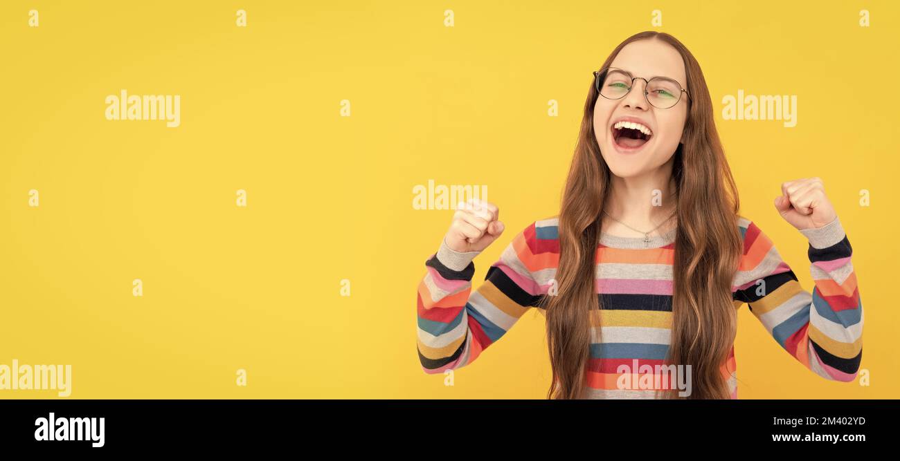 happy schoolgirl nerd teen girl in eyeglasses for vision celebrating ...