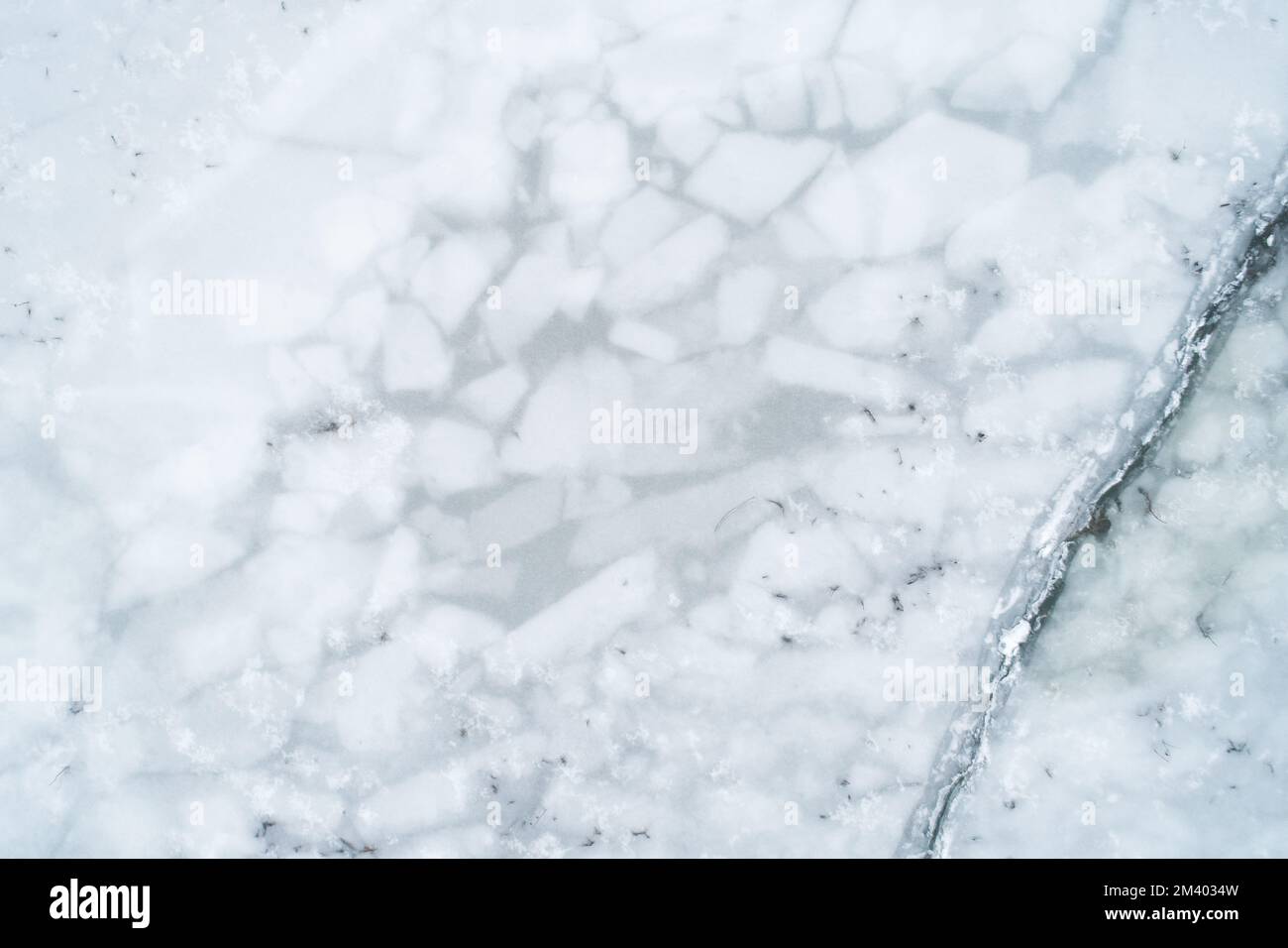 Cracked ice on lake hi-res stock photography and images - Alamy