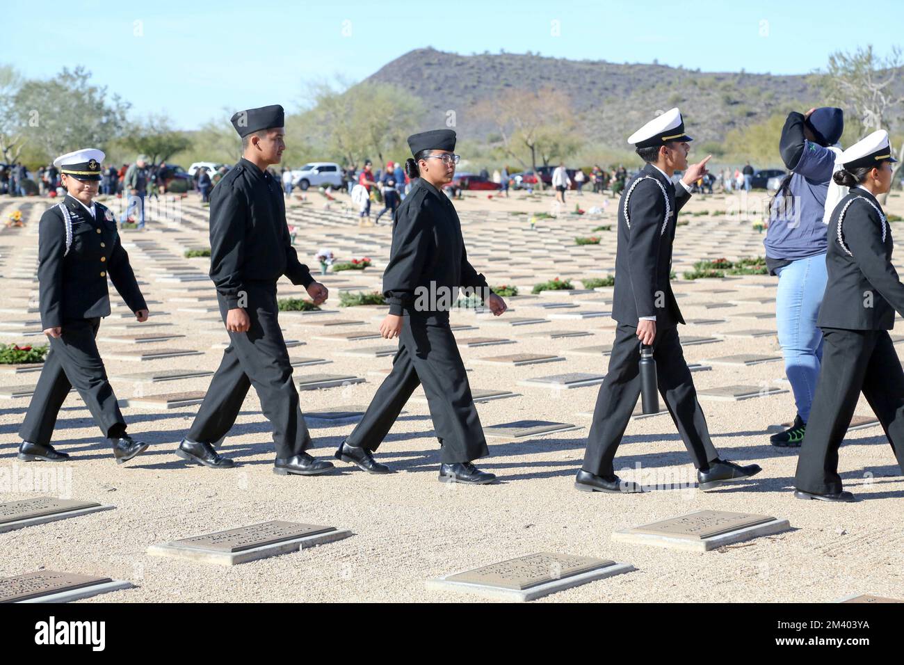 Family members and friends of veterans lay wreaths at the annual ...
