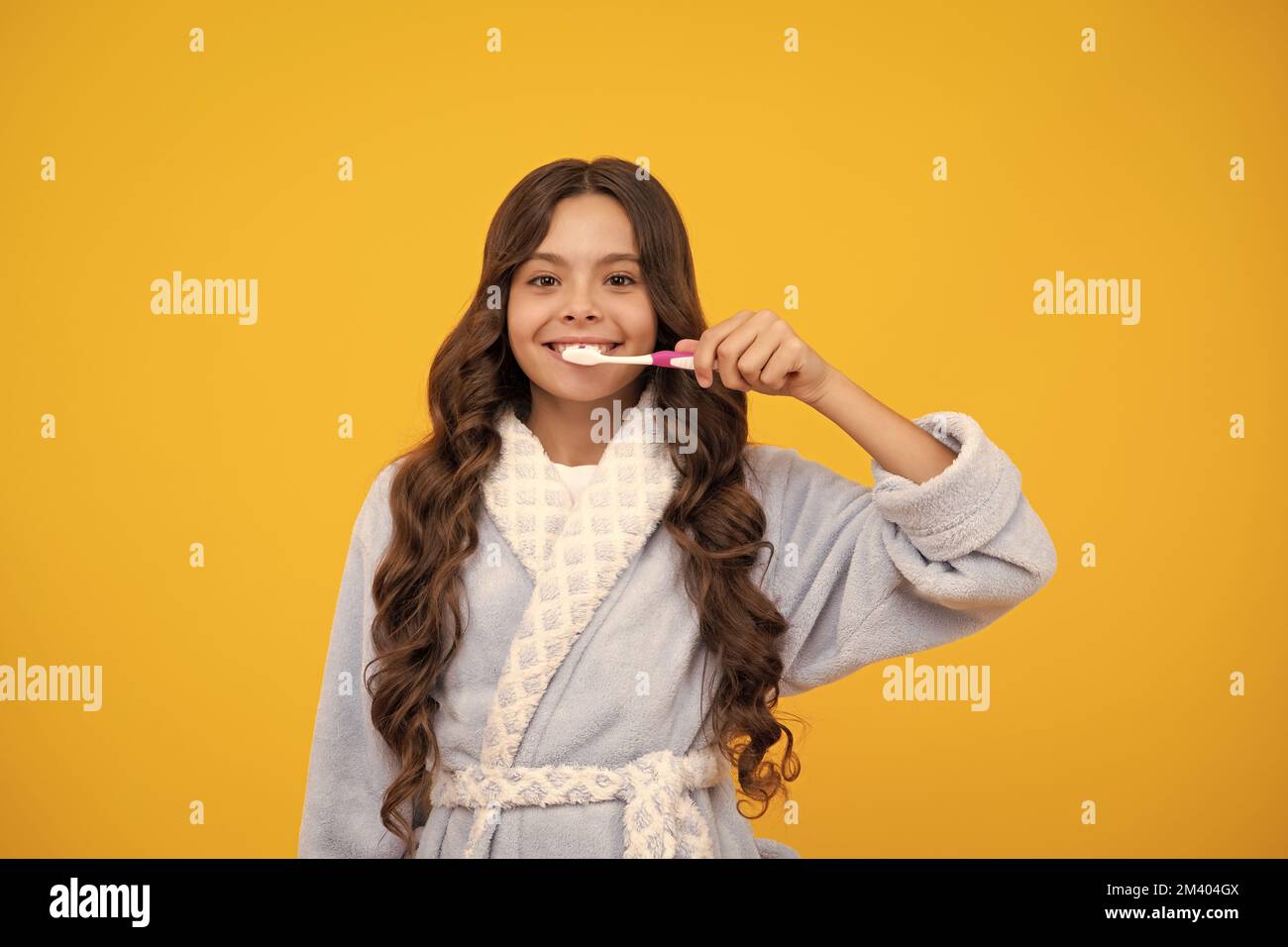 Night brushing teeth. Dental care, hygiene and child. Teenage girl with ...