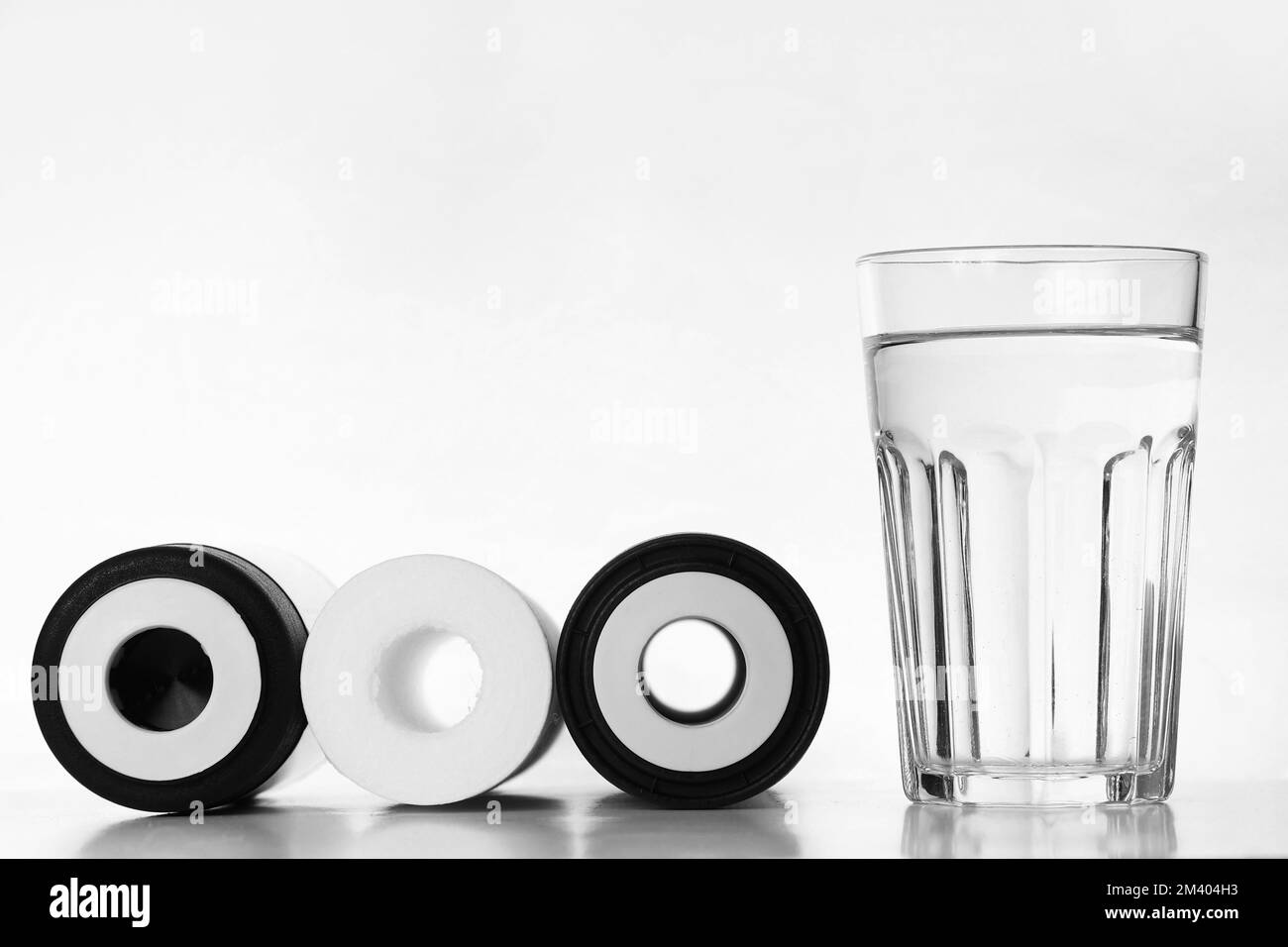 Banner of three of cartridges for water filter with clear fresh glass ...