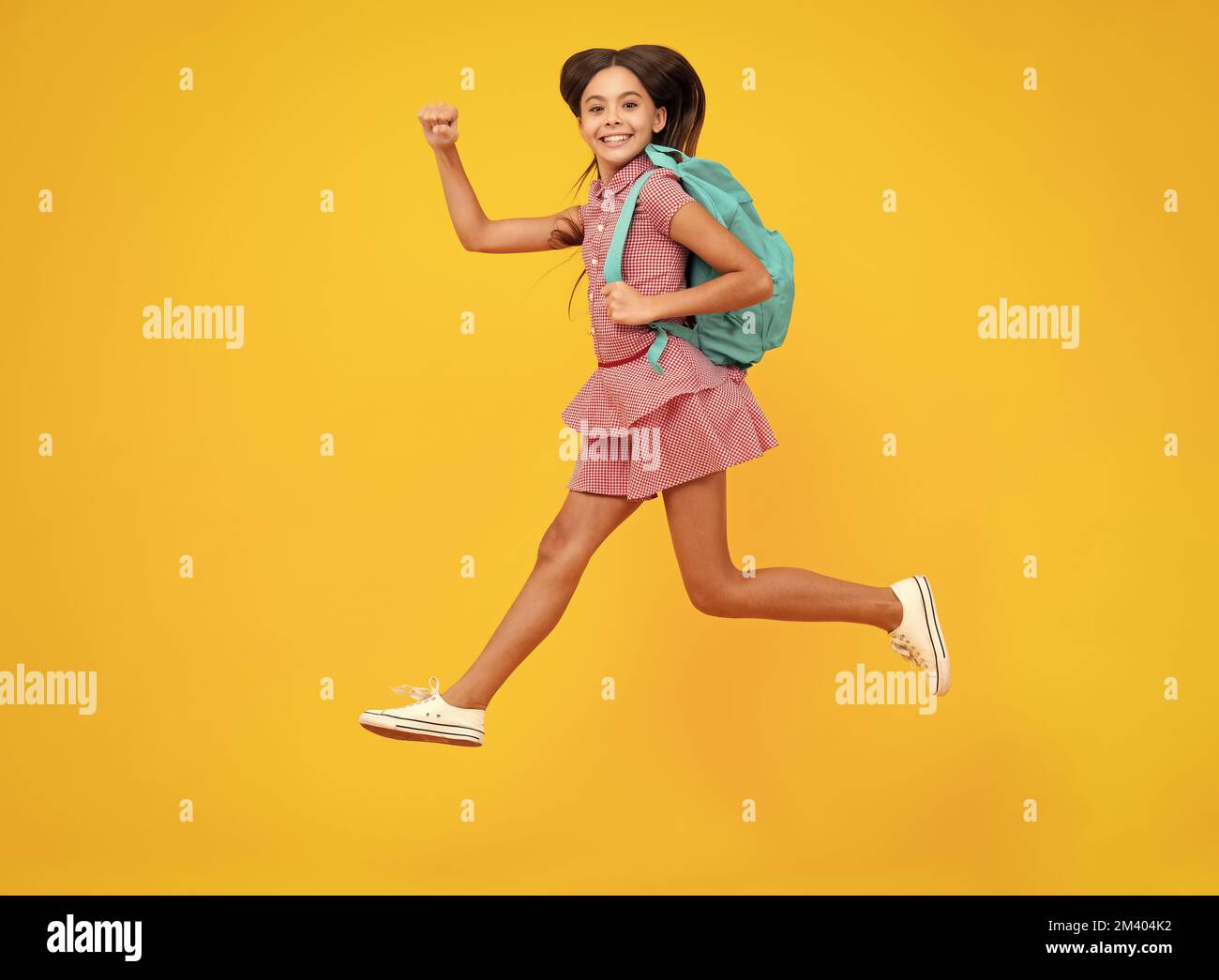 Schoolgirl in school uniform with backpack. Teenage girl student on ...