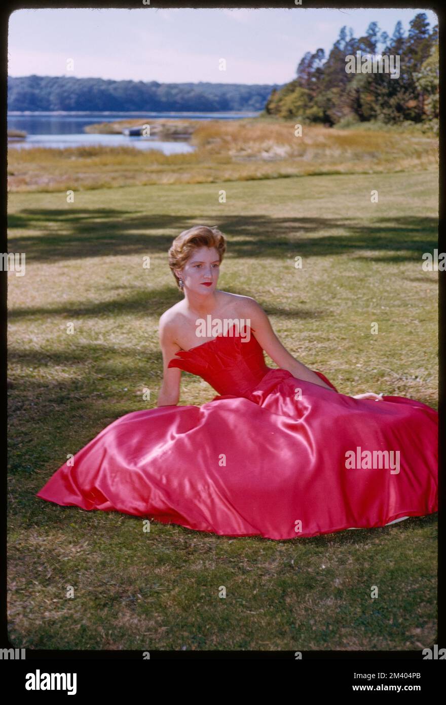 Sidney Bacon at Sherrewogue, R.I., in red dress, Toni Frissell ...