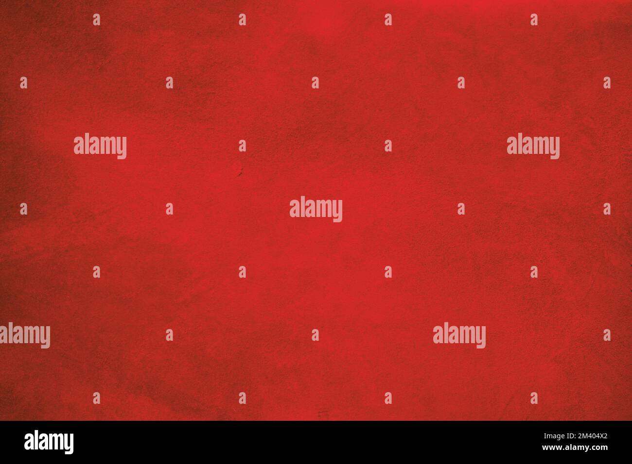 The background is red suede. The texture of suede leather dyed red ...