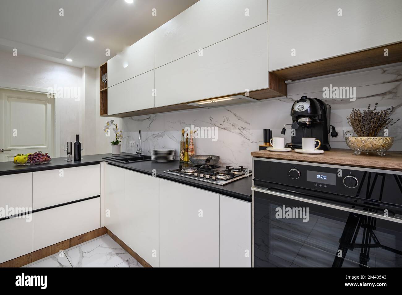 White and black modern luxury kitchen details Stock Photo - Alamy
