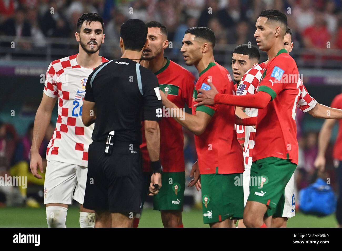 referee AL JASSIM Abdulrahman (QAT) is being pressured by HAKIMI Achraf ...