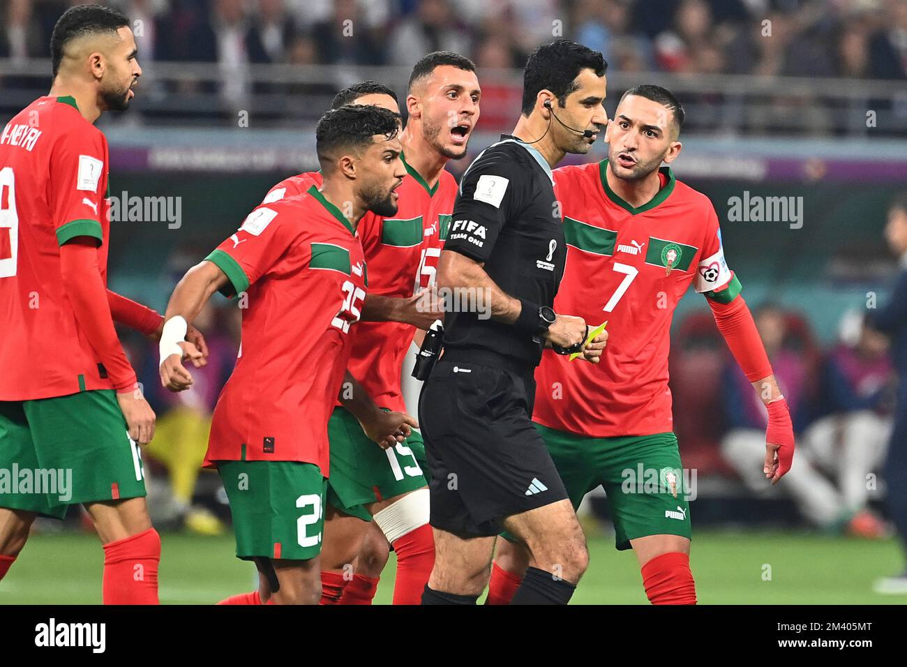 referee AL JASSIM Abdulrahman (QAT) is harassed by EN-NESYRI Youssef ...