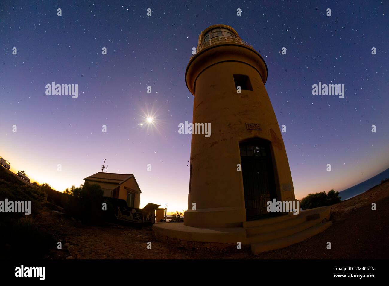 Stars and the moon at night at the Vlamingh Head Lighthouse, Exmouth ...