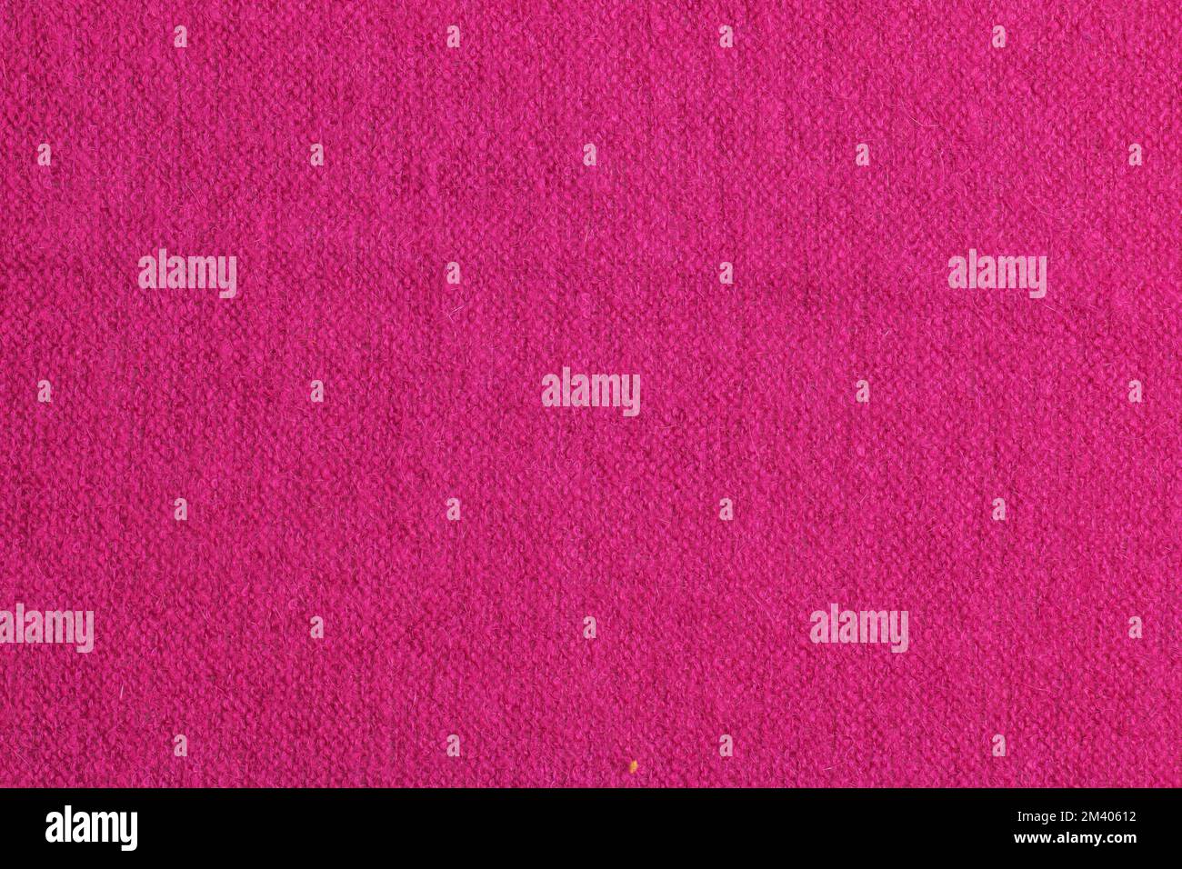 Knitted background in crimson color. Knitted texture of woolen fabric ...