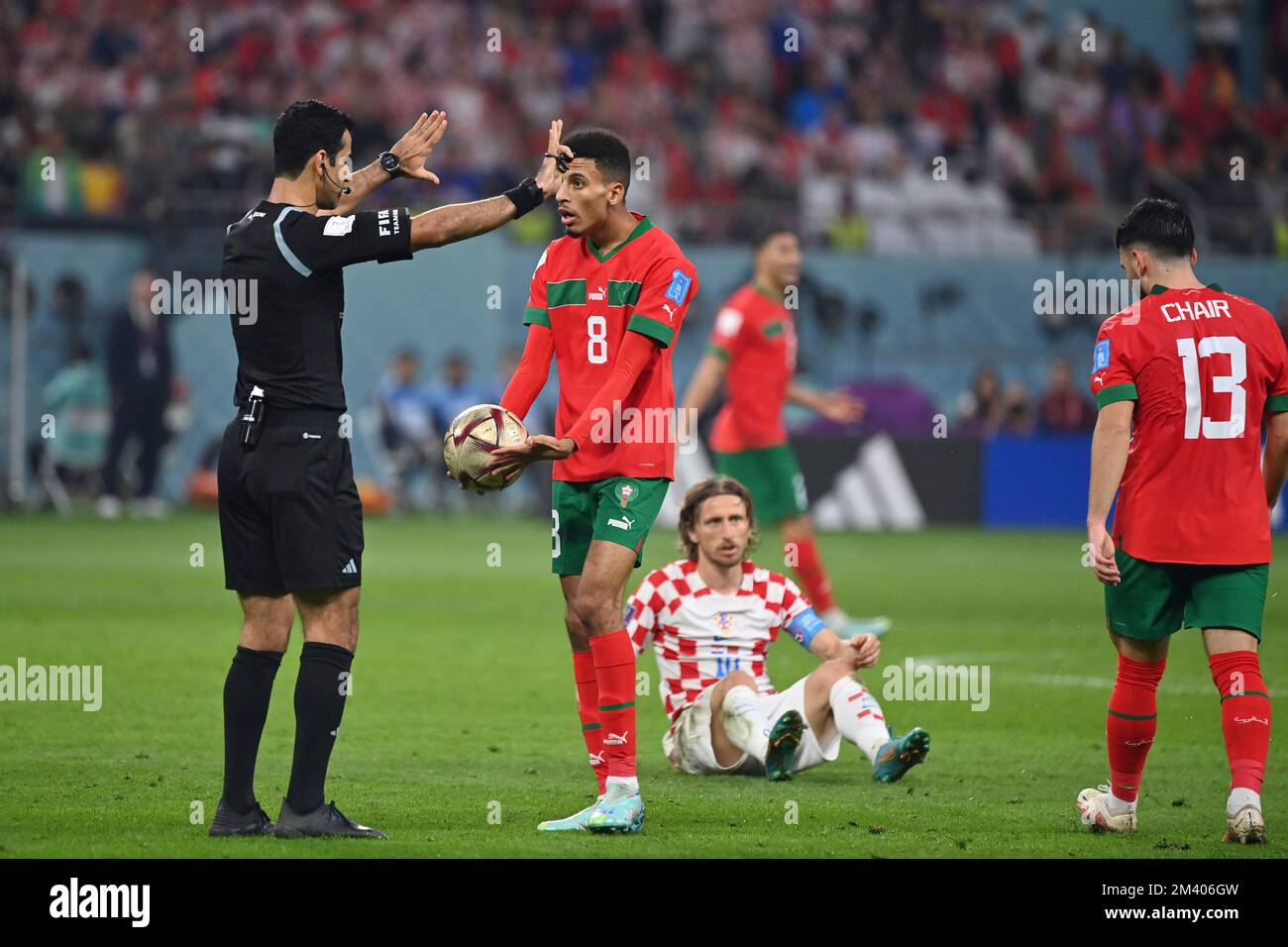 OUNAHI Azzedine (MAR) presses referee AL JASSIM Abdulrahman (QAT). On ...