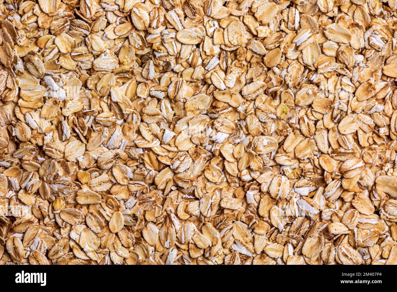 Rolled oat, oat flakes background or texture. Close up. Food concept ...