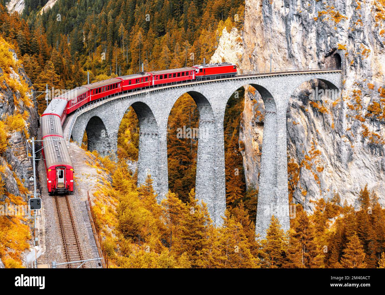Bernina express glacier train on Landwasser Viaduct in autumn ...