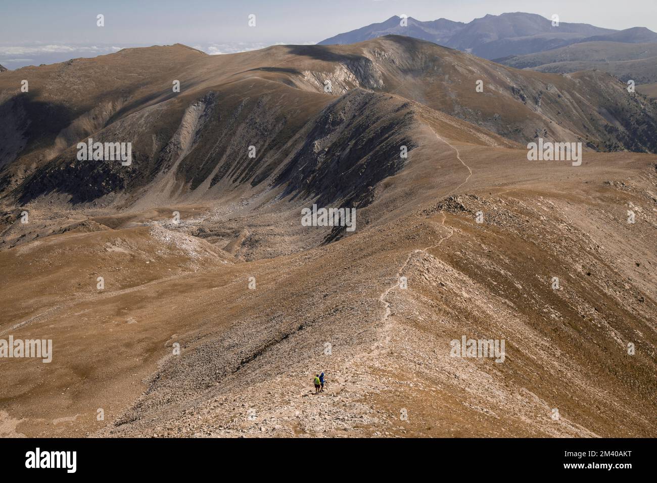 A view from Bastiments peak of People walking in a landscape showing ...