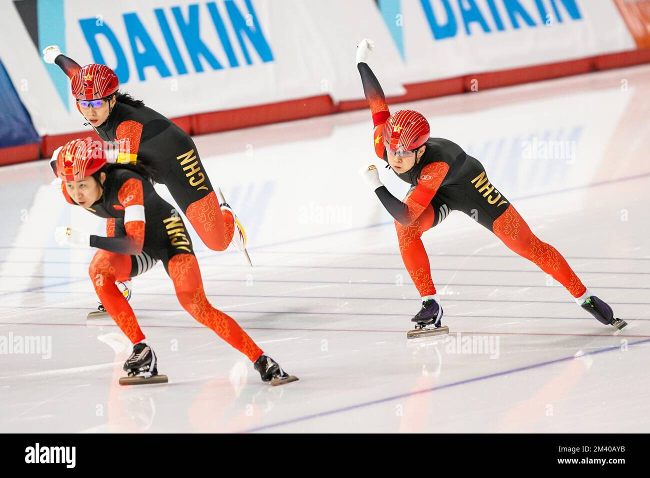 CALGARY, CANADA - DECEMBER 17: Chong Pei of China, Jingzhu Jin of China ...