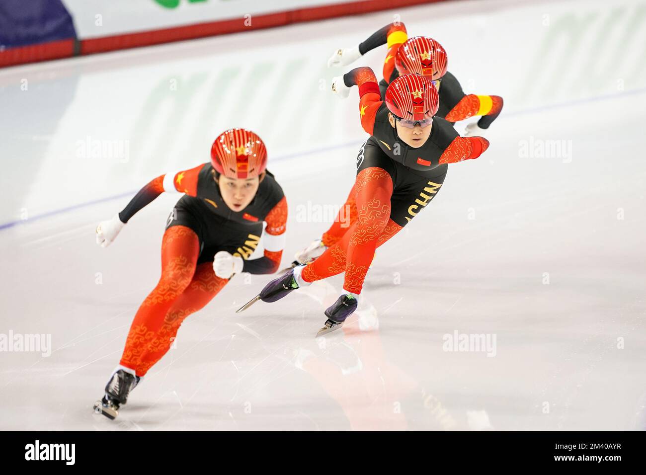 CALGARY, CANADA - DECEMBER 17: Chong Pei of China, Jingzhu Jin of China ...