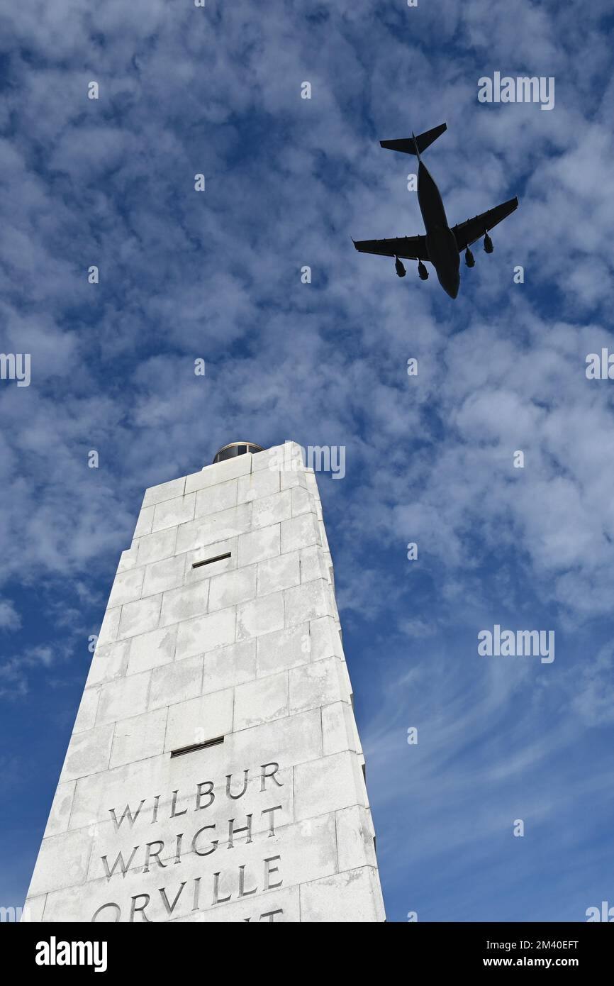 A U.S. Air Force bomber performs a flyover of the Wright Brothers ...