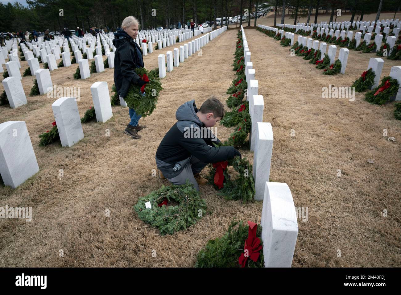 Canton, Georgia, USA. 18th Dec, 2022. Mother and son volunteers place ...