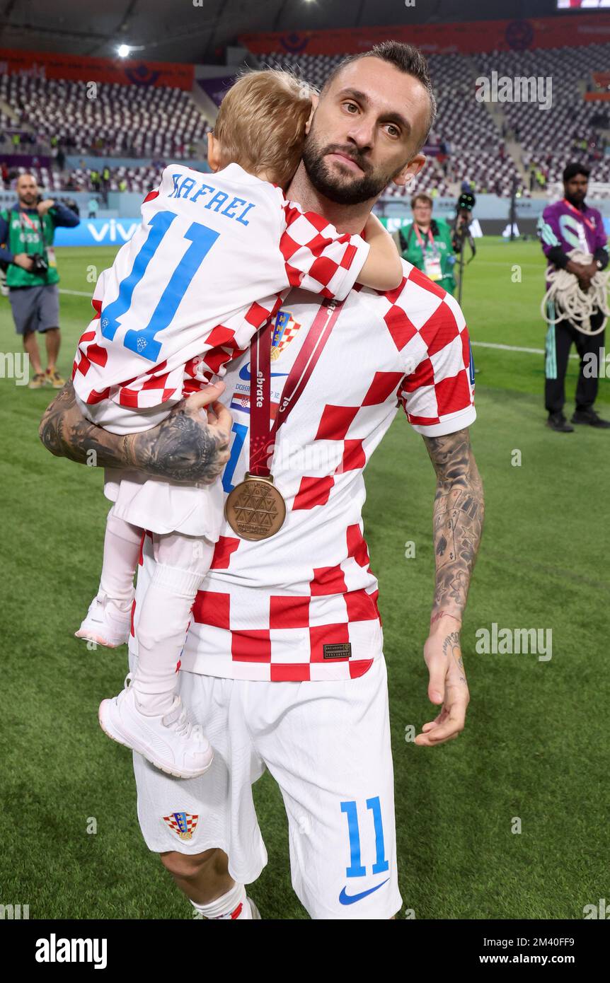 Marcelo Brozovic of Croatia and his child celebrate following the FIFA ...