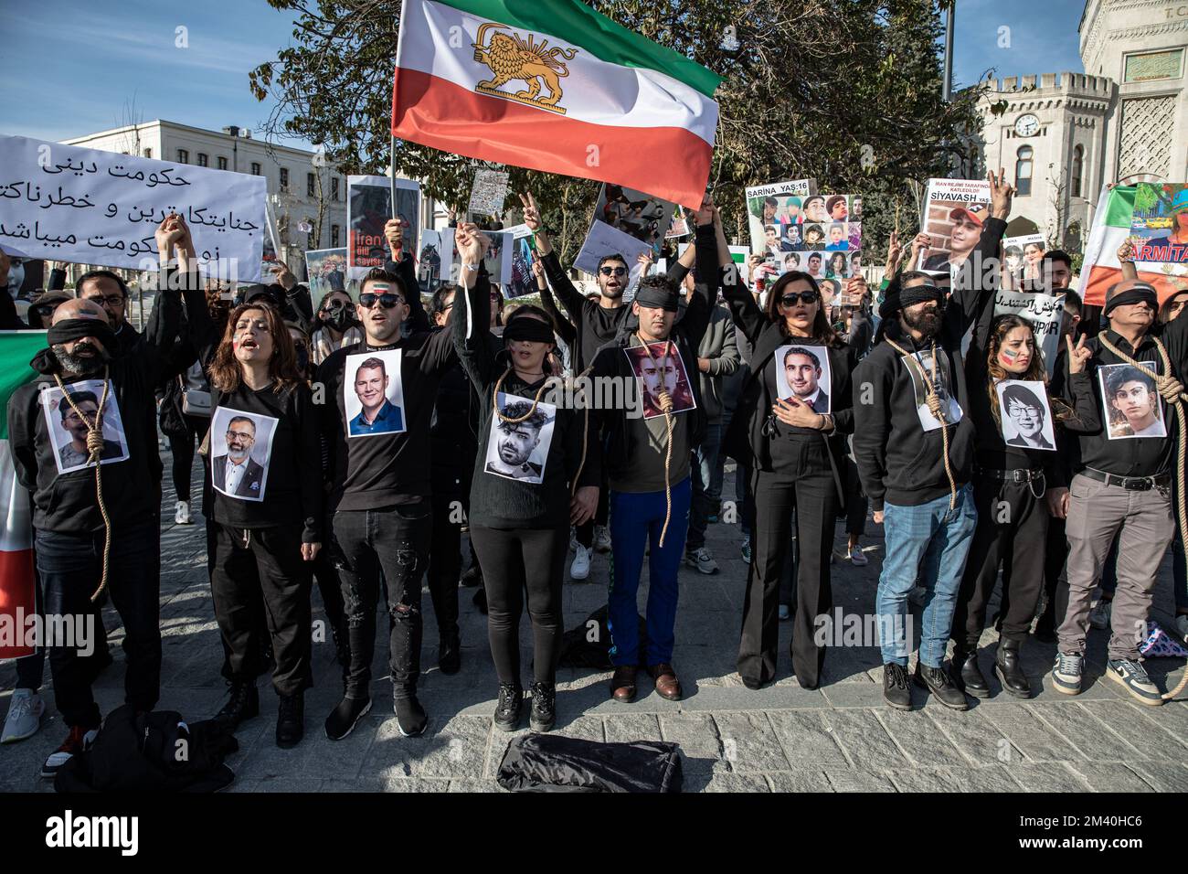 Istanbul, Turkey. 17th Dec, 2022. Protesters perform an execution scene ...