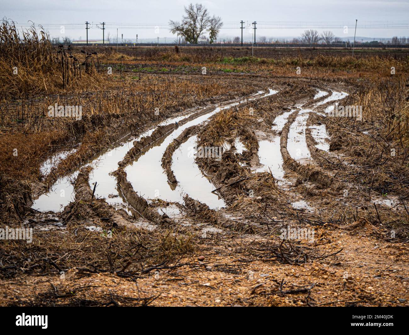 muddy road on a rural highway flooded by winter rains hd image Stock ...