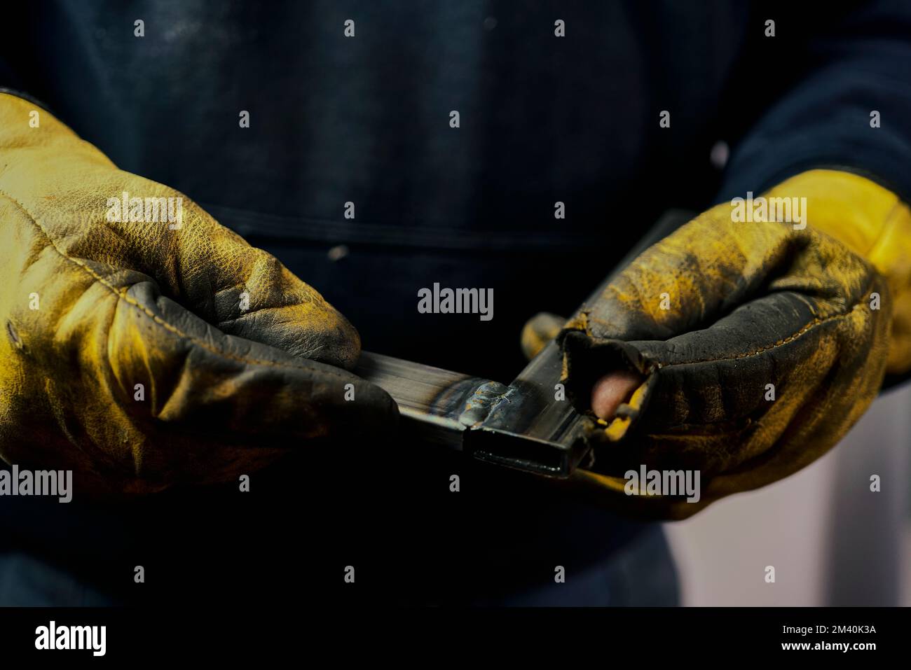 A closeup of a pair of dirty gloves worn by a worker Stock Photo - Alamy