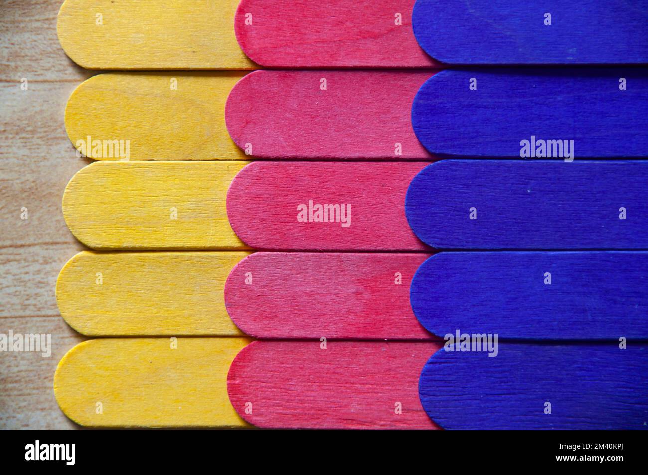 Top view of colored wooden sticks with customizable space for text ...