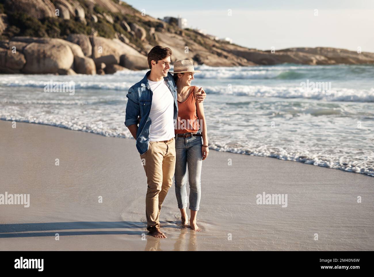 Nothing is as soothing as a walk on the beach. a middle aged couple ...
